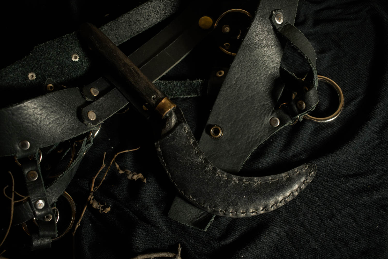 Leather belt and sickle in it's sheath